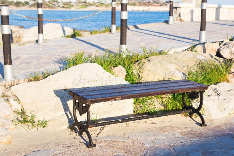 Wooden Bench in Front of the Sea Stock Photo - Image of alone, horizon ...