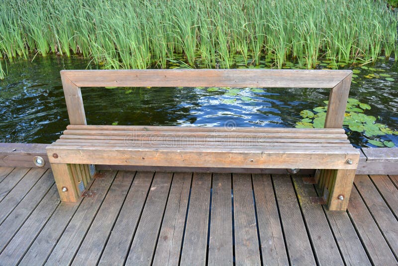 Wooden Bench on Lake Coast in Park Stock Image - Image of wooden, relax ...