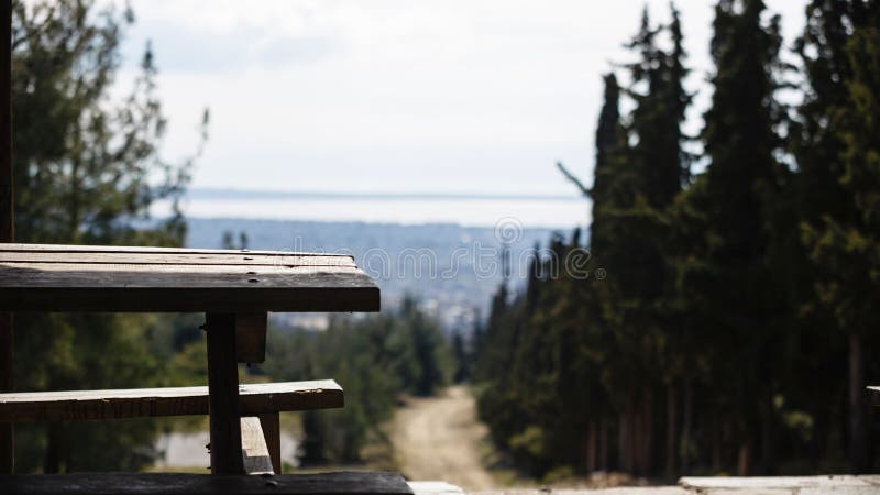 Wooden Bench and a Narrow Path Going Down To the Beach an City Stock ...