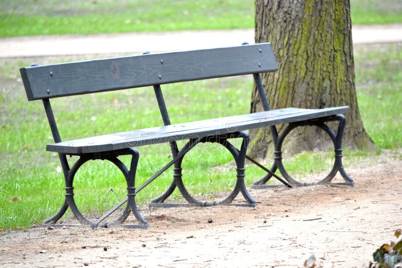 Wooden bench in park stock image. Image of park, wood - 131870137