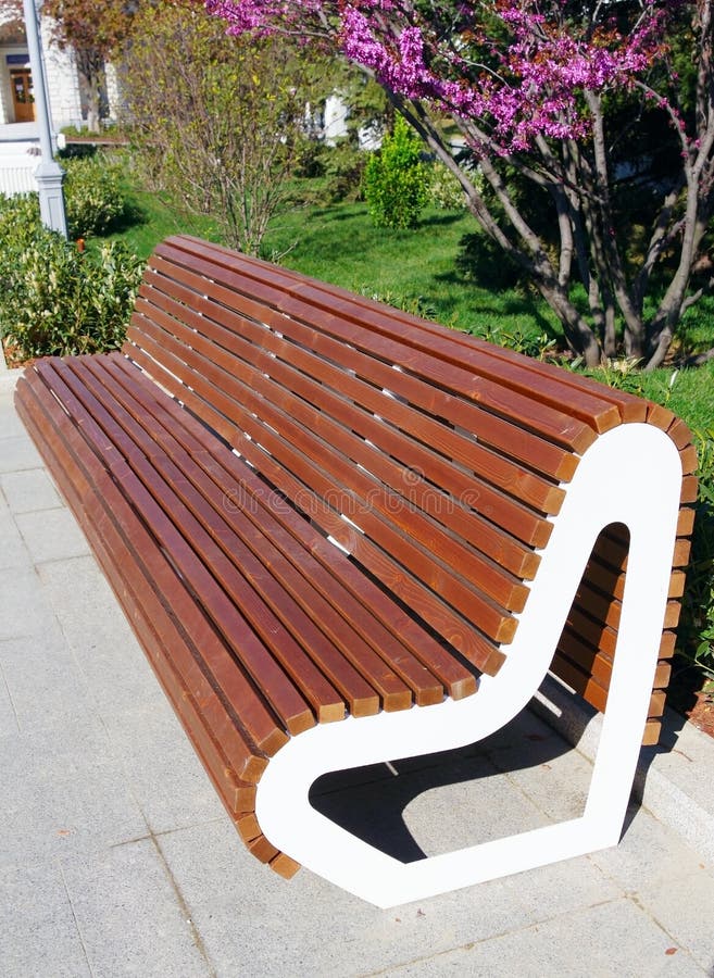Wooden bench in the park stock image. Image of garden - 182225549