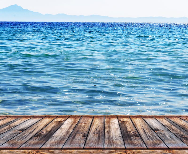 Wooden bench at the sea stock image. Image of hardwood - 85407479