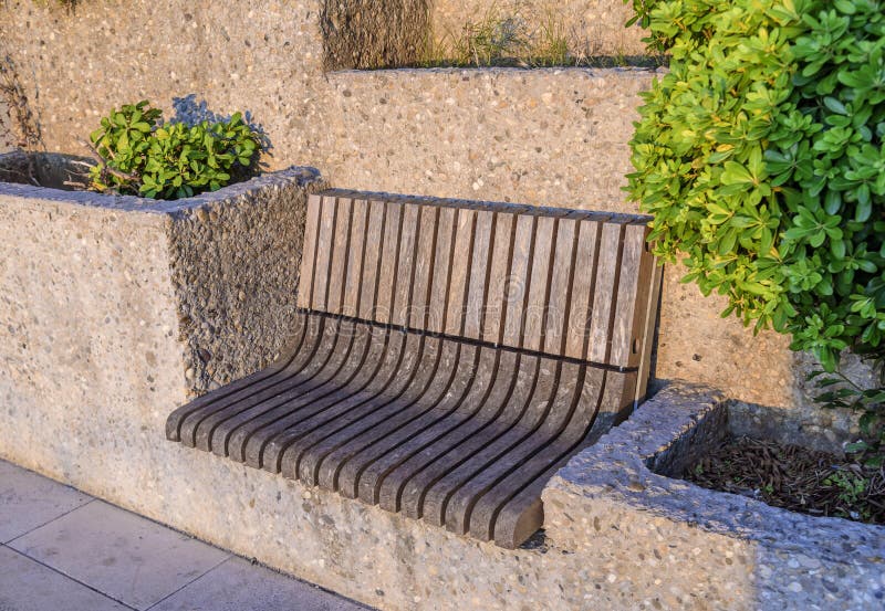 Wooden Bench in a Stone Architectural Structure. Stock Photo - Image of ...