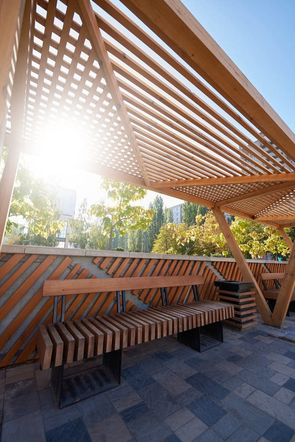 Wooden Benches with a Canopy in the City Park Stock Photo - Image of ...