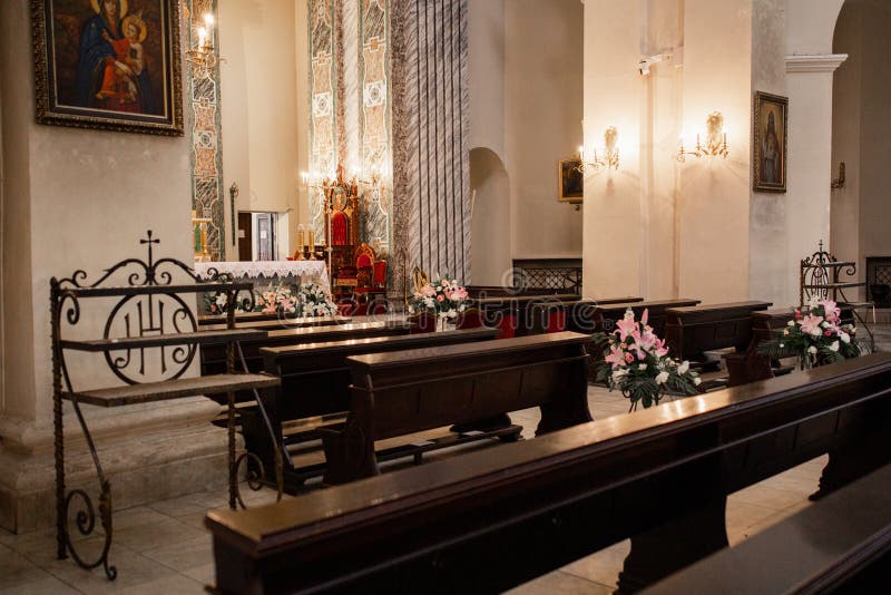 Wooden Benches in a Catholic Church Interior Stock Photo - Image of ...