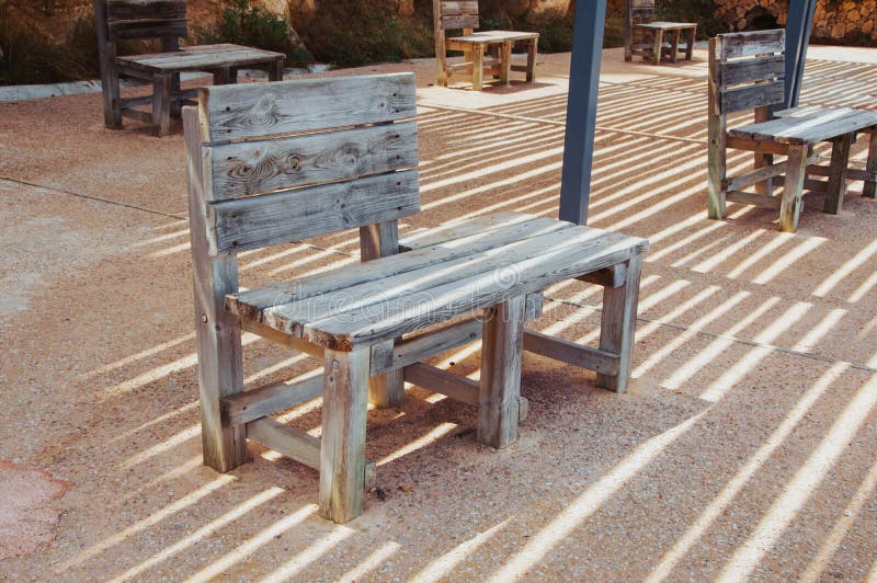 Wooden Benches with Spaces for Social Distancing Stock Photo - Image of ...