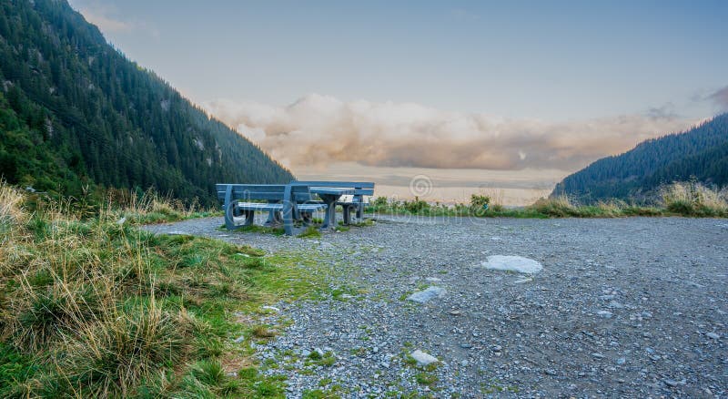 Wooden Benches with a Table in the Mountains Stock Image - Image of ...