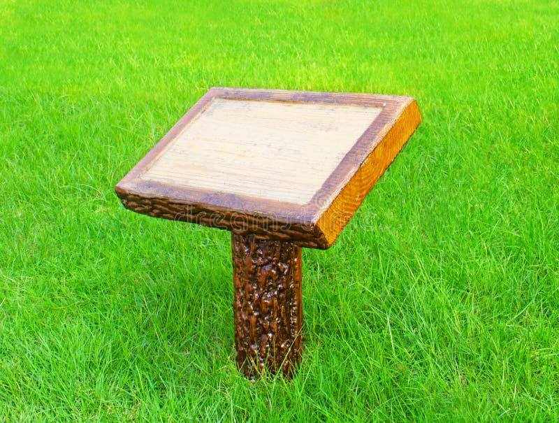 Wooden blank sign on grass stock photo. Image of hotel - 47076922