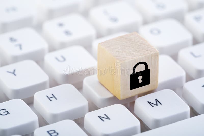 Wooden Block with Lock Graphic on Computer Keyboard. Stock Photo ...