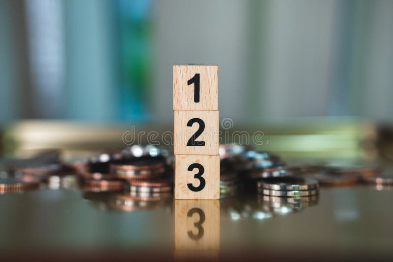 Wooden Block Number with Stack Coins Stock Photo - Image of coins ...