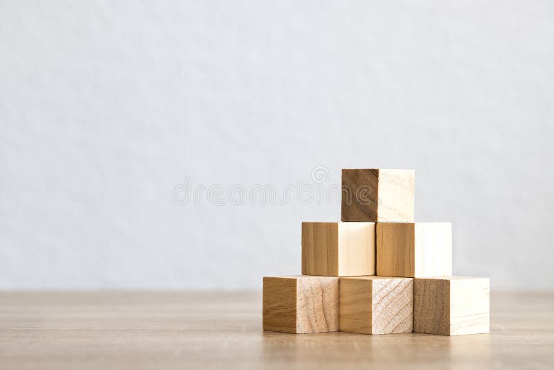 Wooden Block Pyramid on Table Stock Image - Image of abstract, copy ...