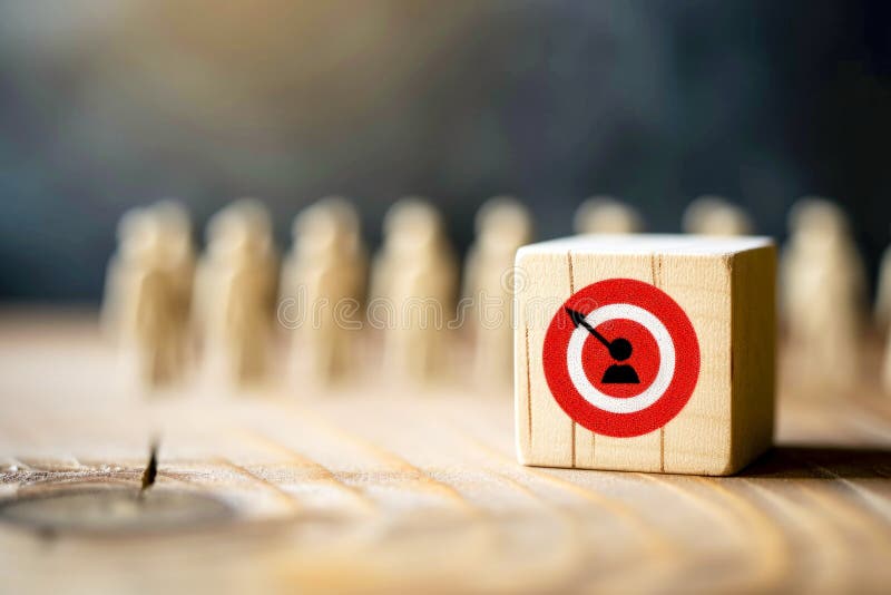 A Wooden Block with a Red Target on it Sits on a Wooden Table Stock ...