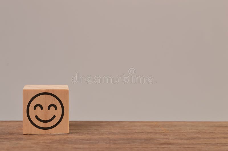 Wooden Block with Smile Face Icon. Customer Evaluation and Satisfaction ...