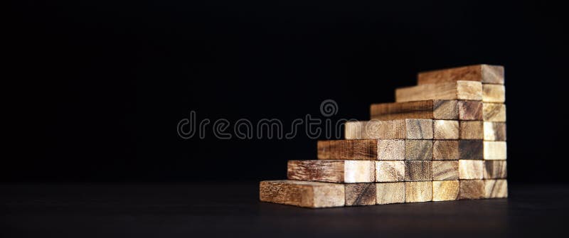 Wooden Block Tower Stack in Pyramid Stair Step with Caution To Prevent ...