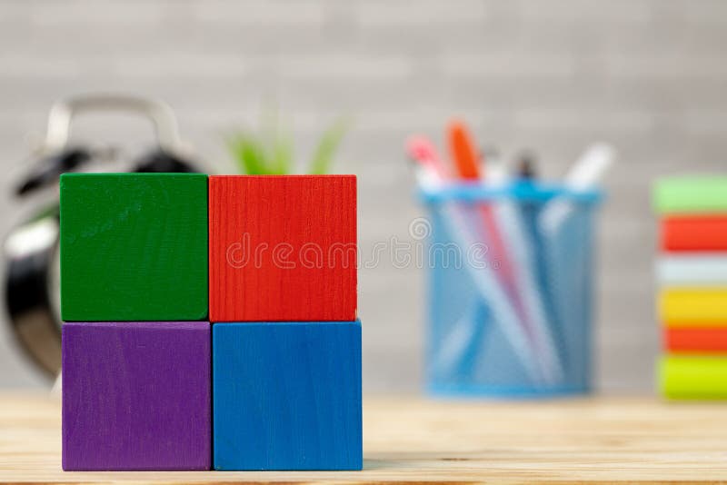 Wooden Blocks and Alarm Clock on Wooden Desk Stock Image - Image of ...