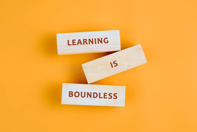 Wooden Blocks Arranged To Display the Phrase Learning is Boundless Sit ...