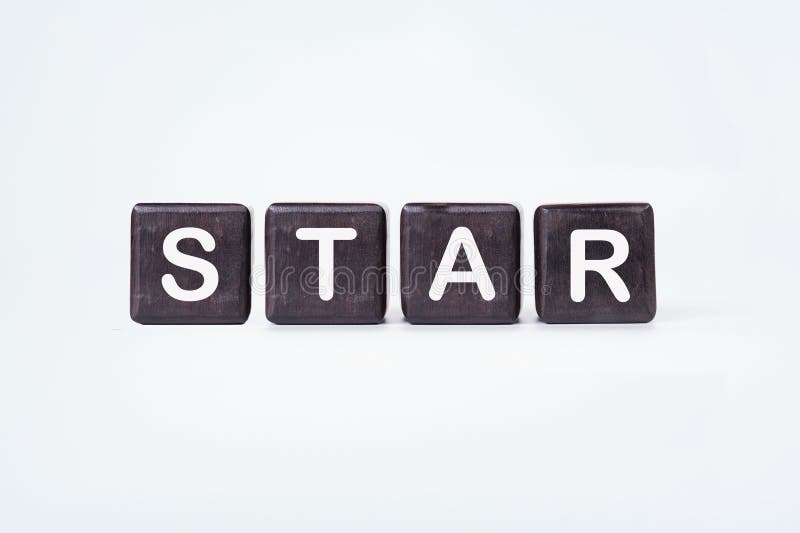 Wooden Blocks Arranged To Form the Word Star, Creating a Visually ...