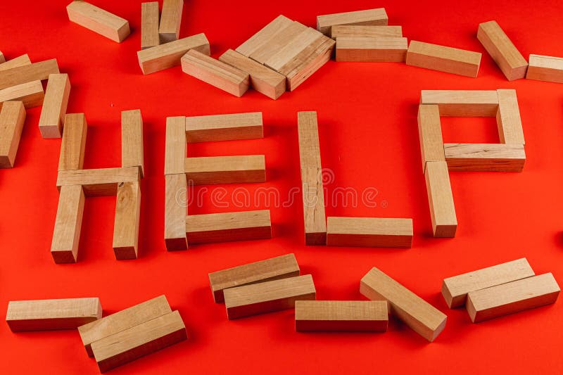 Wooden Blocks Spell Out Help on a Red Background Stock Image - Image of ...