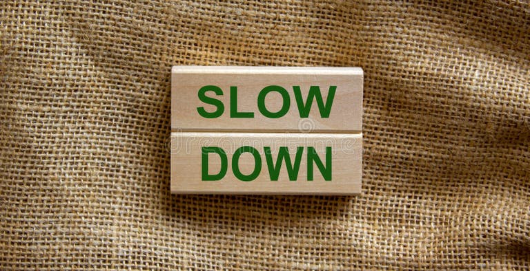 Wooden Blocks Form the Text `slow Down` on Beautiful Canvas Background ...