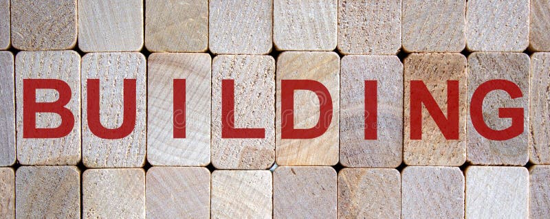 Wooden Blocks Form the Word `building`. Beautiful Wooden Background ...