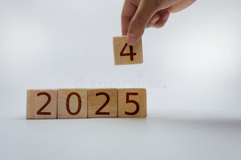 Wooden 2024-2025 Blocks with Hand Changing the Year Digit Stock Image ...