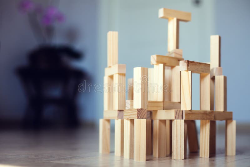 Wooden Blocks are Made Up in a Complex Structure Close-up. the Concept ...