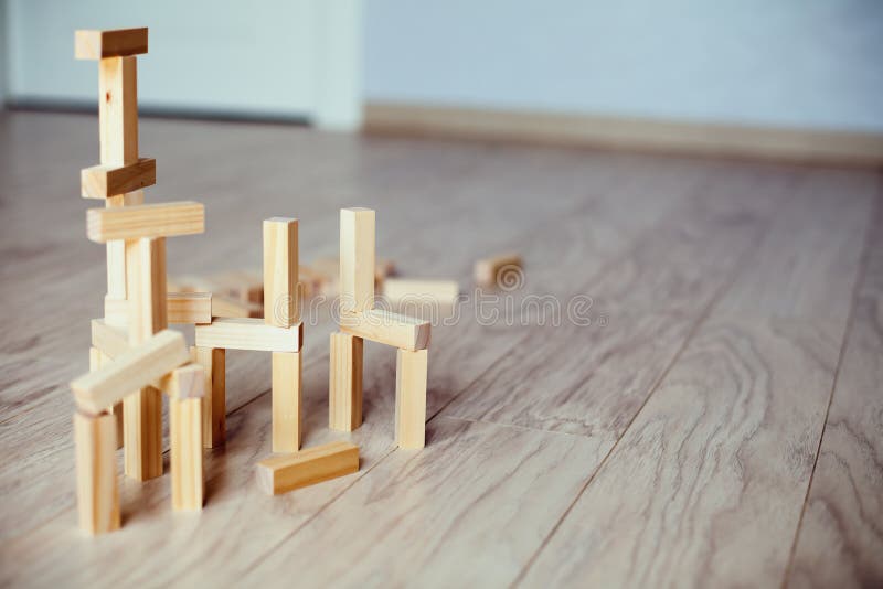Wooden Blocks are Made Up in a Complex Structure Close-up. the Concept ...