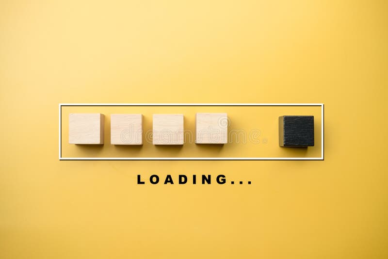 Wooden Blocks in Progress Bar with LOADING Wording Under Bar. Loading ...