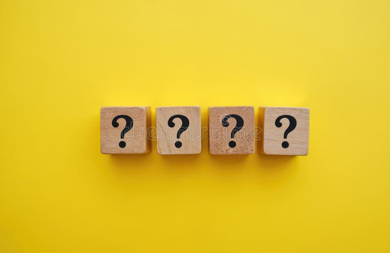 Wooden Blocks with Question Marks on Bright Yellow Background. Simple ...