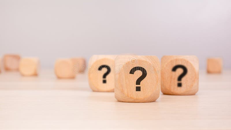 Wooden Blocks with Question Marks Symbolizing Uncertainty, Decision ...