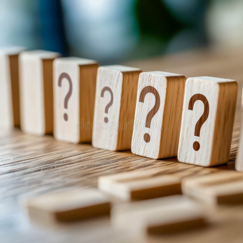 Wooden Blocks with Question Marks on a Table in Soft Focus Background ...