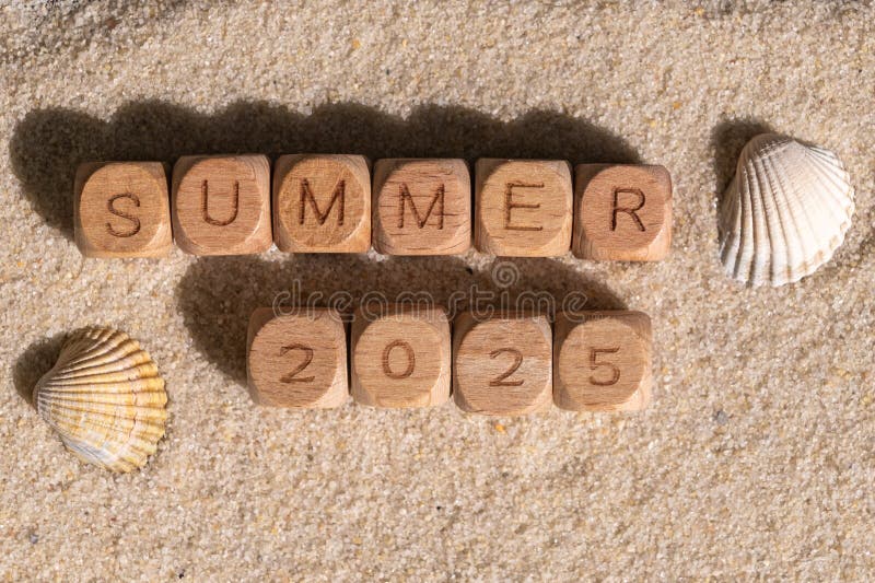 Wooden Blocks Spelling Summer 2025 on Sandy Beach with Seashells Stock ...