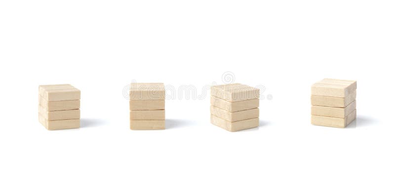 The Wooden Blocks are Stacked in Layers with Geometric Shapes on Each ...