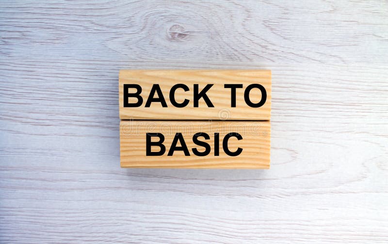 Wooden Blocks with Text Back To Basic on the Wooden Background Stock ...