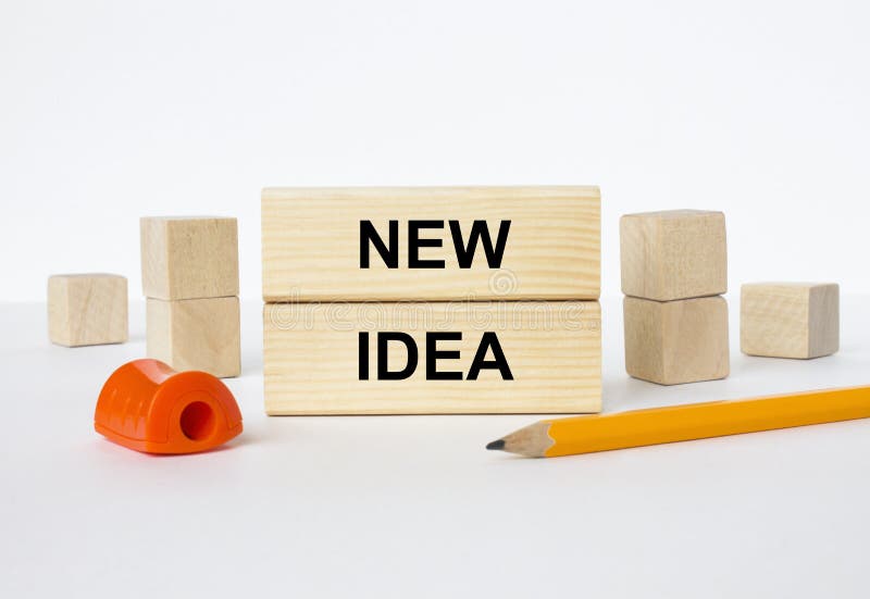 Wooden Blocks with Text New Idea with Sharpener and Pencil Stock Image ...