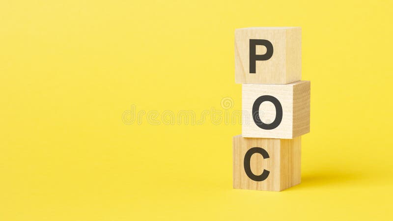 Wooden Blocks with the Text POC - Short for Proof of Concept on a ...
