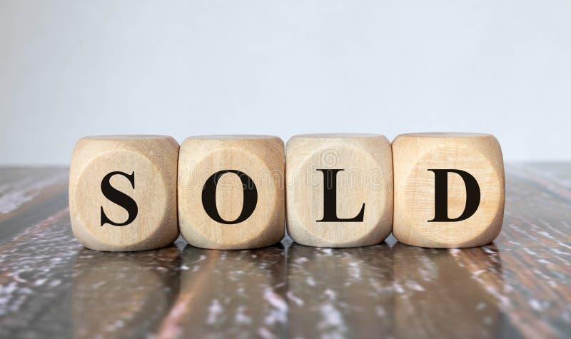 Wooden Blocks with the Text: Sold, Concept Stock Photo - Image of ...