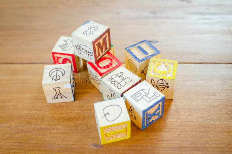Wooden Blocks on Wooden Table Stock Photo - Image of alphabet ...