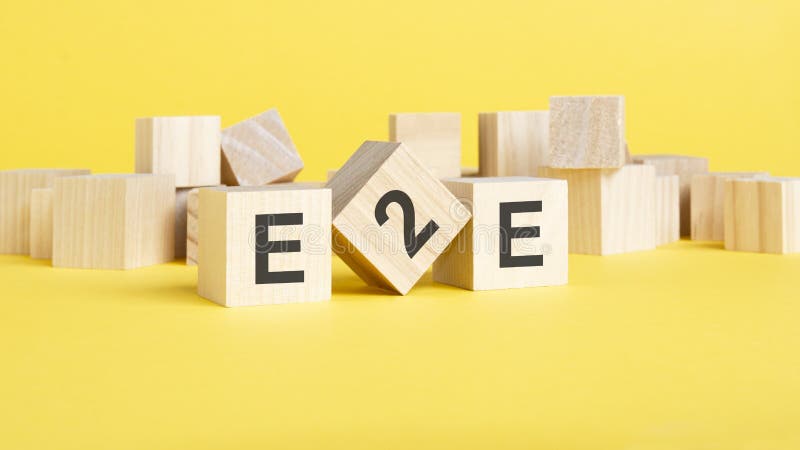 Wooden Blocks with Word E2e on Yellow Background. End To End Concept ...