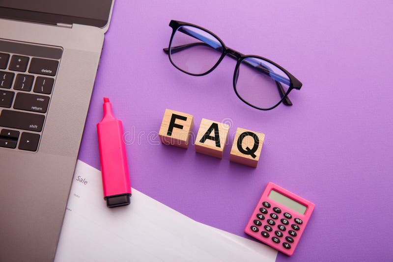 Wooden Blocks with Word FAQ on Pink Table. Frequently Asked Question ...