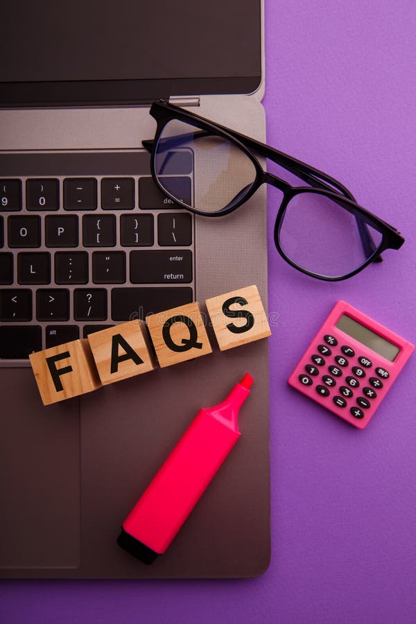 Wooden Blocks with Word FAQS on Pink Table. Frequently Asked Question ...