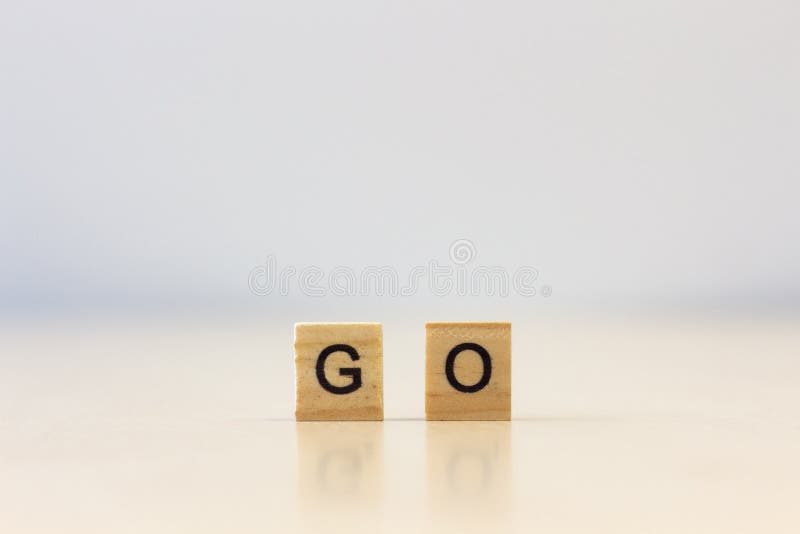 Wooden blocks word `GO` stock image. Image of isolated - 143873831 Wooden blocks word `GO` stock image. Image of isolated - 143873831