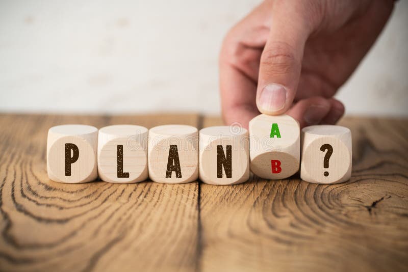 Wooden Blocks with Word PLAN and Decision between Plan a and Plan B ...