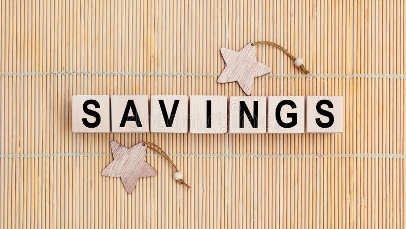 Wooden Blocks with the Word SAVINGS Stock Image - Image of clock ...