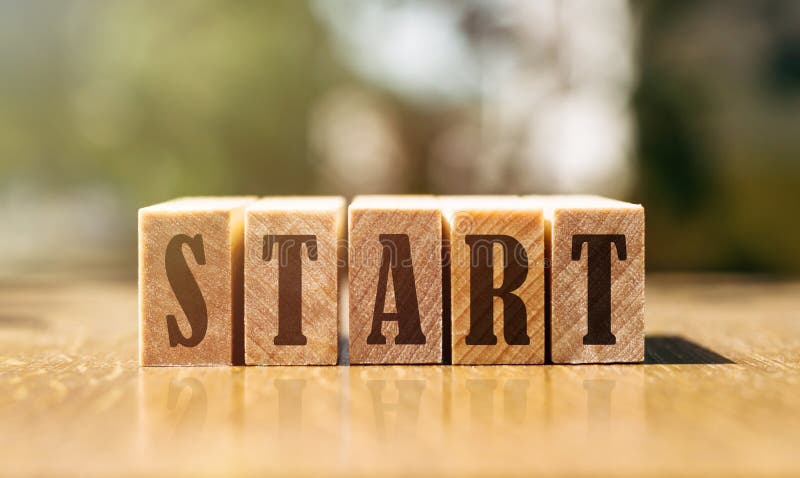 Wooden Blocks with the Word START in Black Letters Stock Image - Image ...