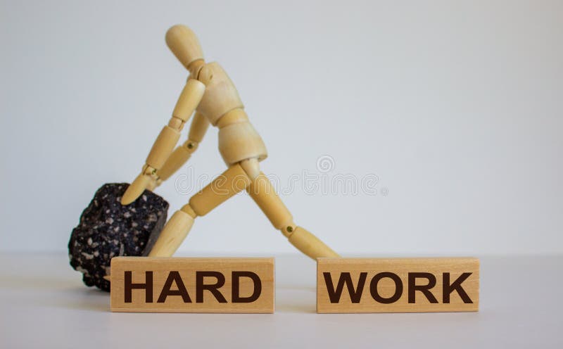 Wooden Blocks with Words `hard Work`. Wooden Model of Human with Black ...