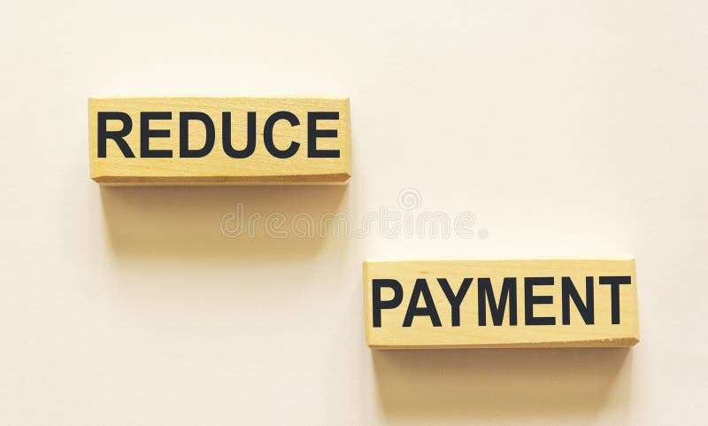 Wooden Blocks with the Words Reduce Payment. Stock Image - Image of ...