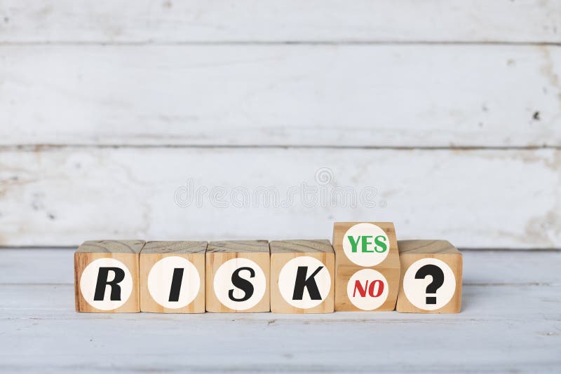Wooden Blocks with the Words Risk and Rise. Enterprise Risk Management ...