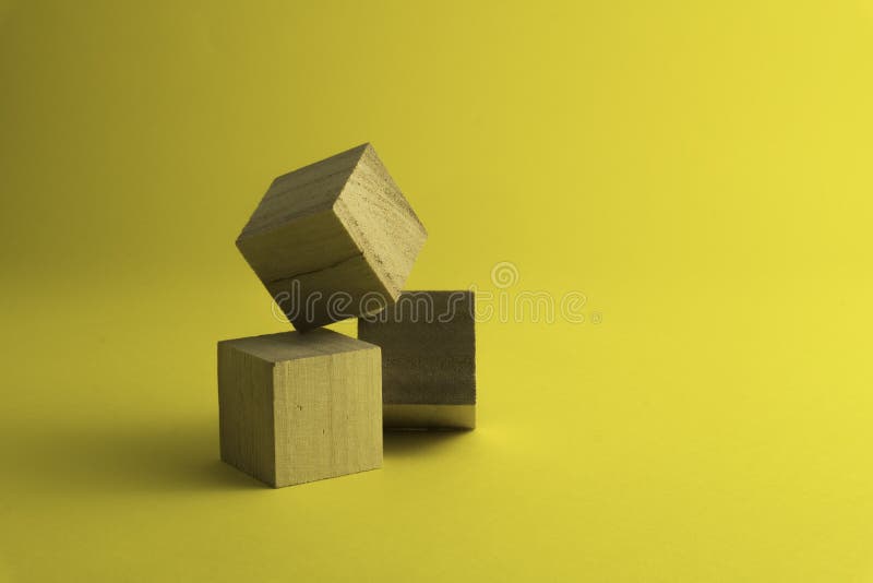 Wooden Blocks on a Yellow Background. Stock Photo - Image of cubes ...
