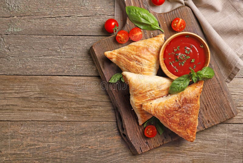 Wooden Board with Delicious Meat Samosas on Table Stock Photo - Image ...